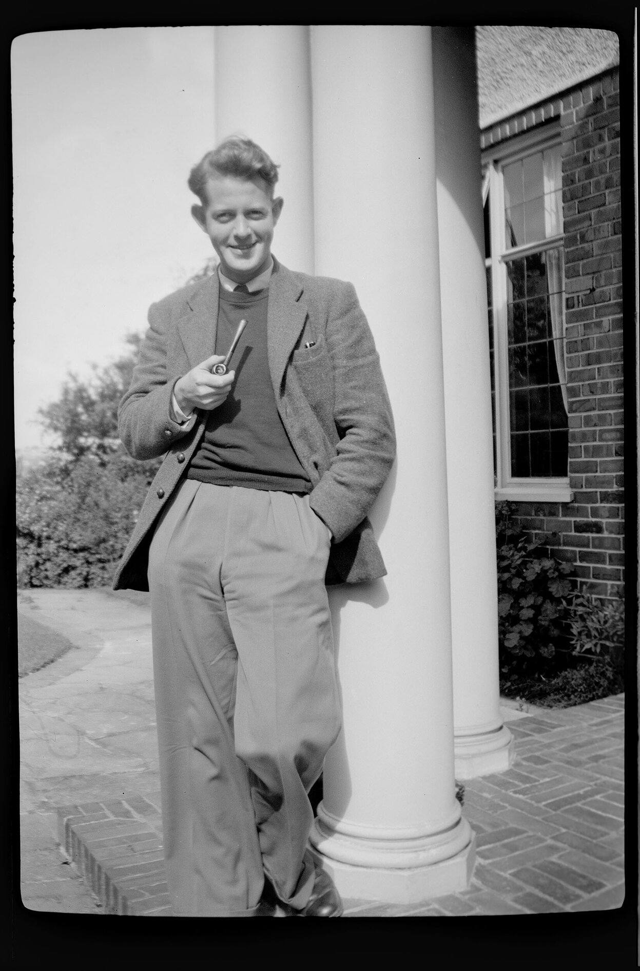 Tim Thompson with pipe | Hocken Digital Collections